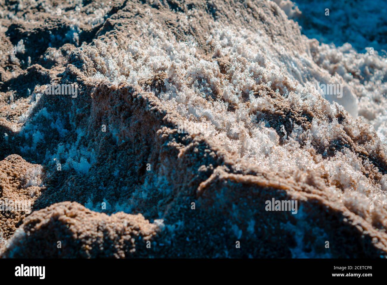 Frozen sand on Lake Michigans beach Stock Photo - Alamy
