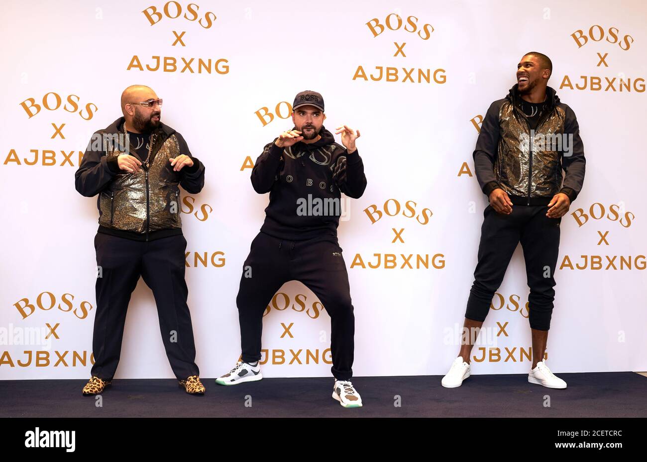 Boxer Anthony Joshua (right) with Seapa Mustafa (MC Grindah) and Asim ...