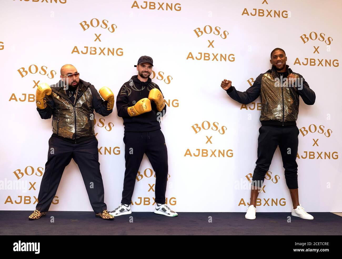 Boxer Anthony Joshua (right) with Seapa Mustafa (MC Grindah) and Asim ...