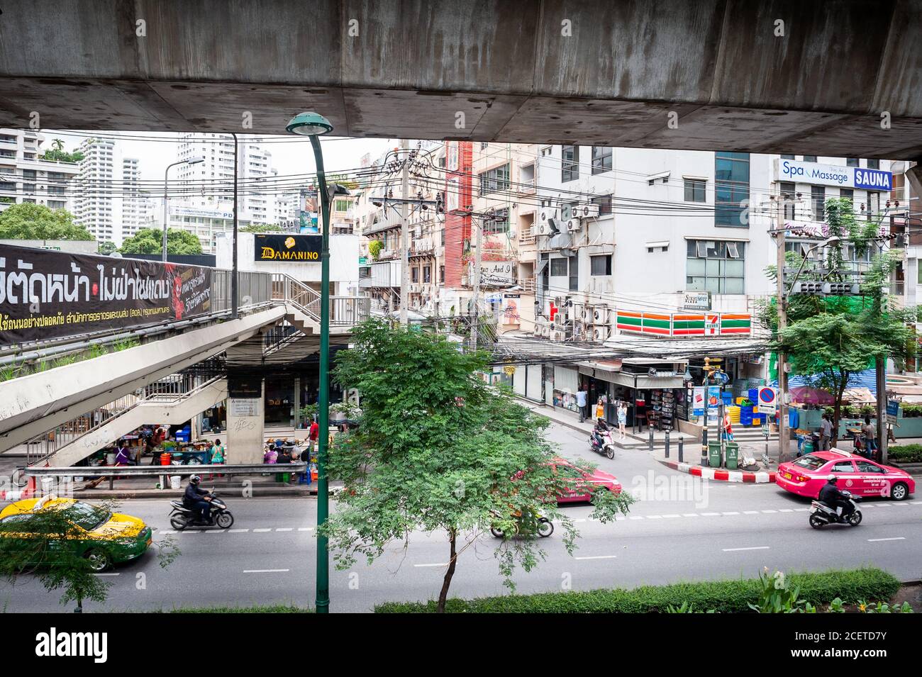 The view down Sukhumvit Rd. taken from a walk way by the BTS sky train ...