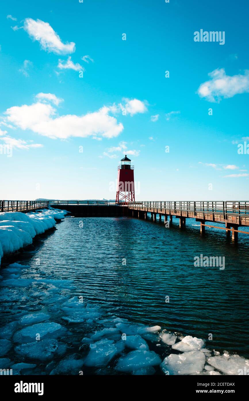 Lake Michigan thawing out at the South Pier lighthouse in Charlevoix MI ...