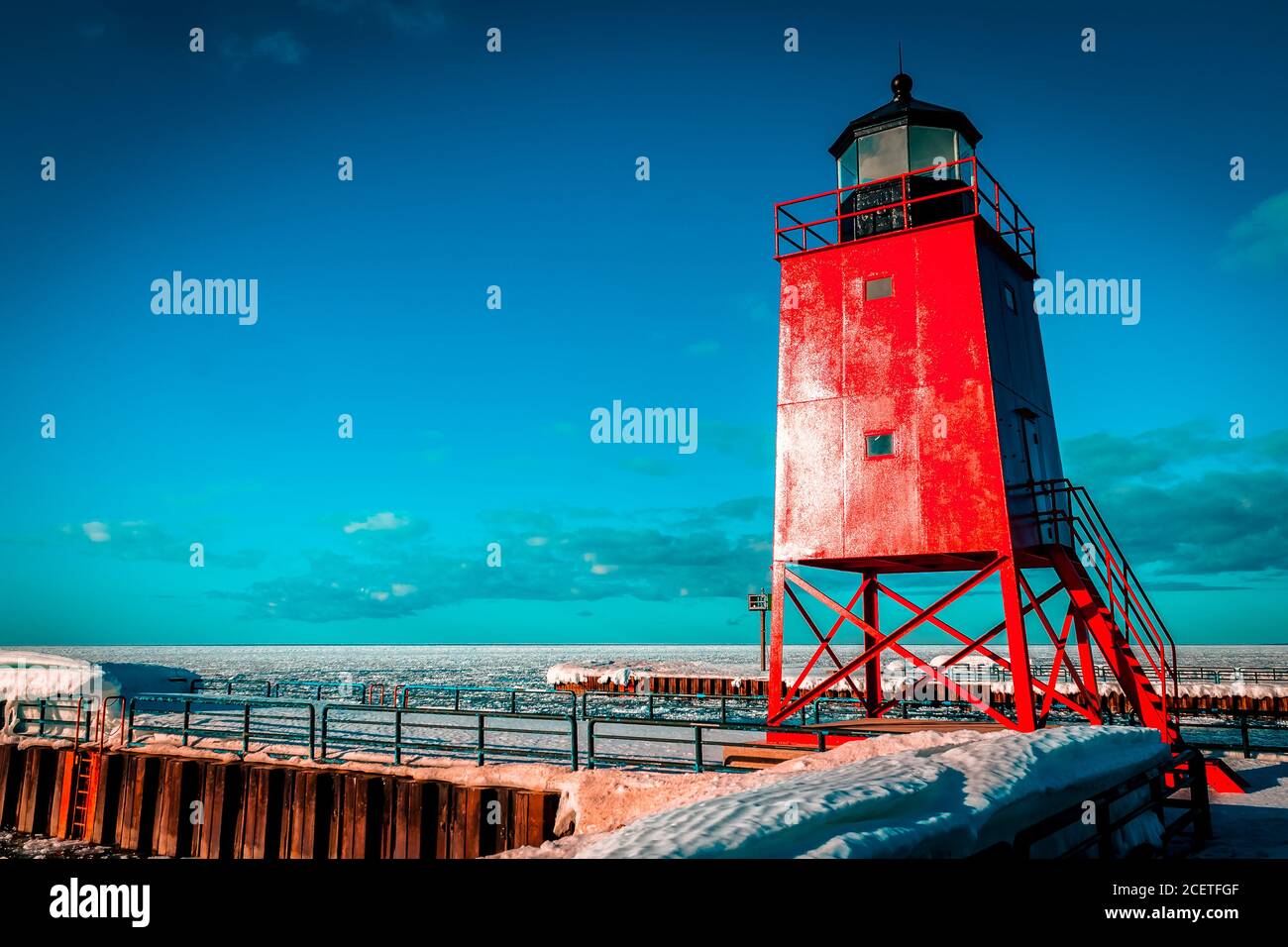 South Pier Lighthouse in Charlevoix Michigan during winter Stock Photo ...