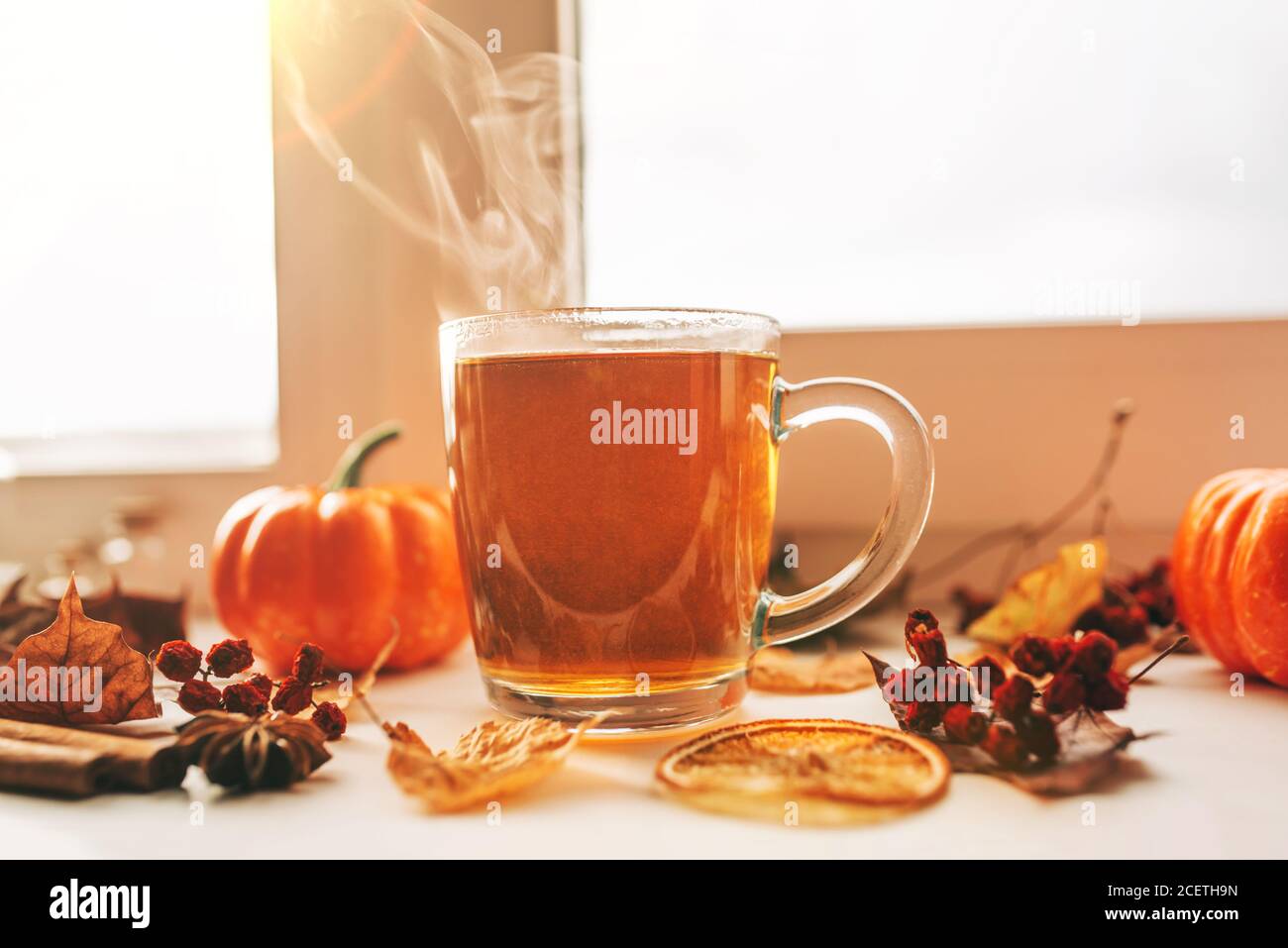 Autumn hot steaming cup of tea Stock Photo - Alamy