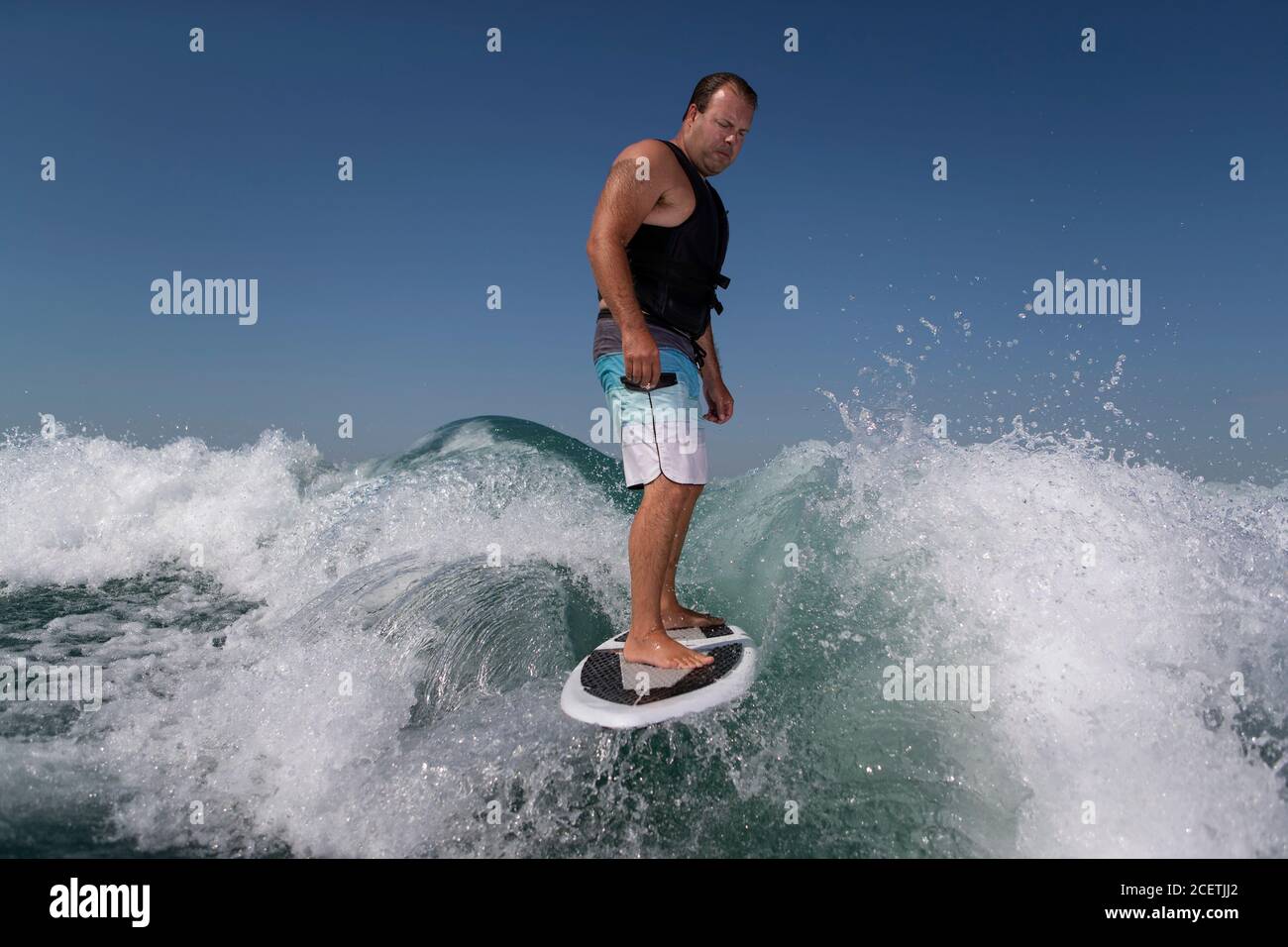 Man wave hi-res stock photography and images - Alamy