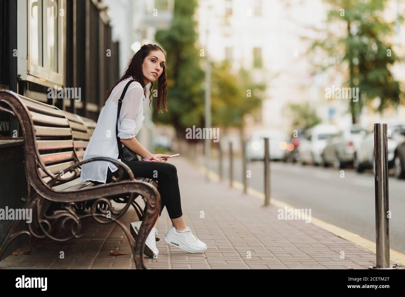 Young woman bus station hi-res stock photography and images - Alamy