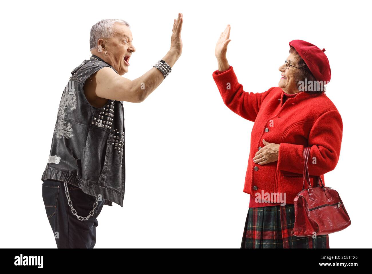 Elderly man and woman gesturing high-five isolated on white background ...