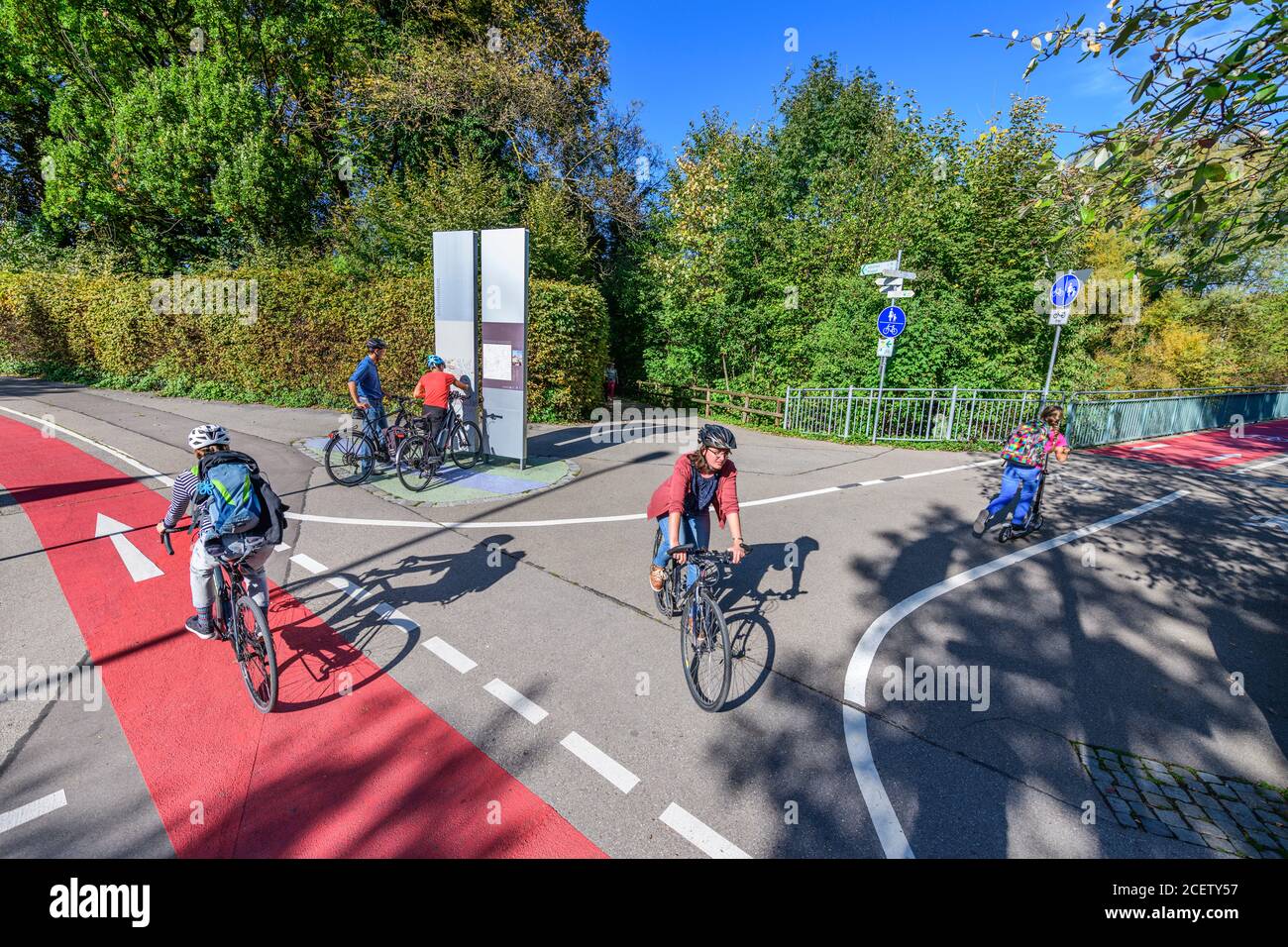 A lot of traffic at a cycle path intersection with other traffic ...