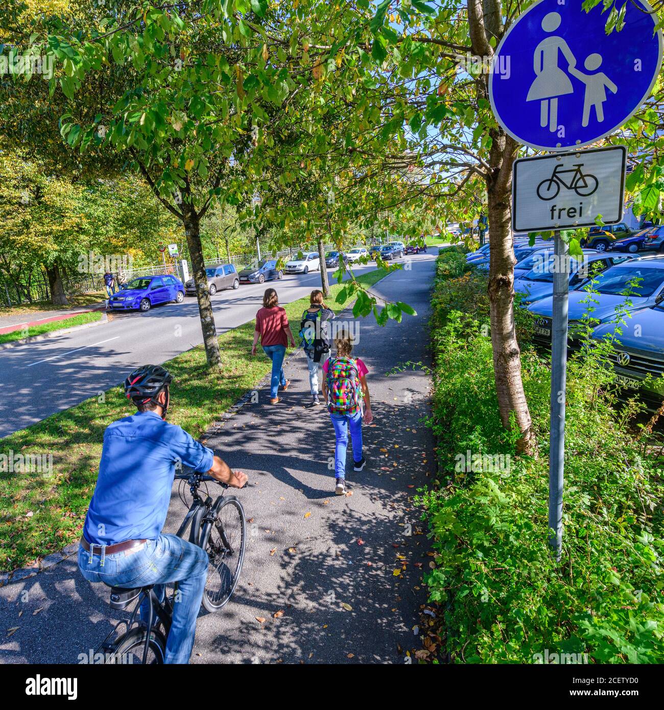 A lot of traffic at a cycle path intersection with other traffic ...