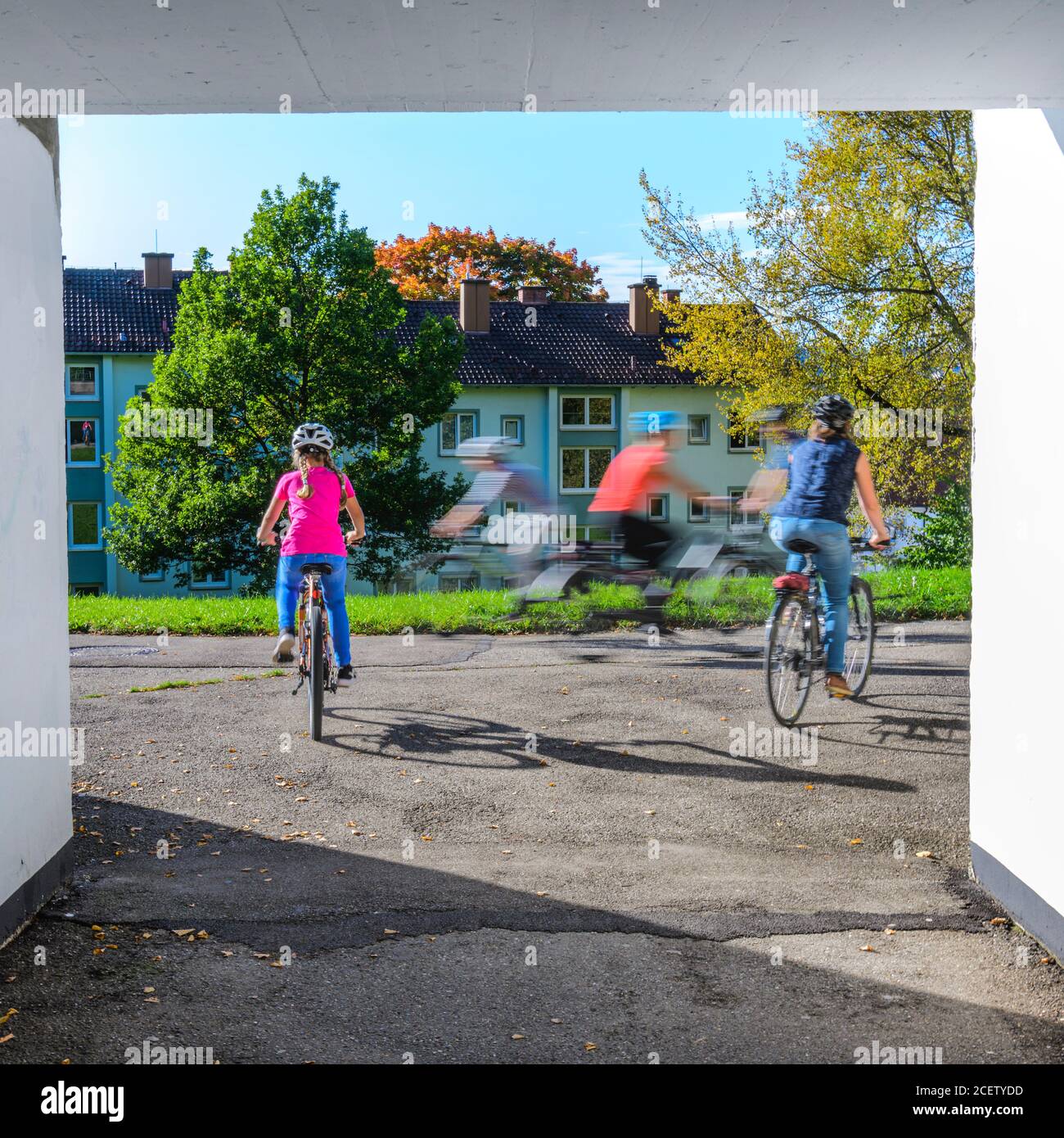 Dangerous situation on bike road crossing Stock Photo - Alamy