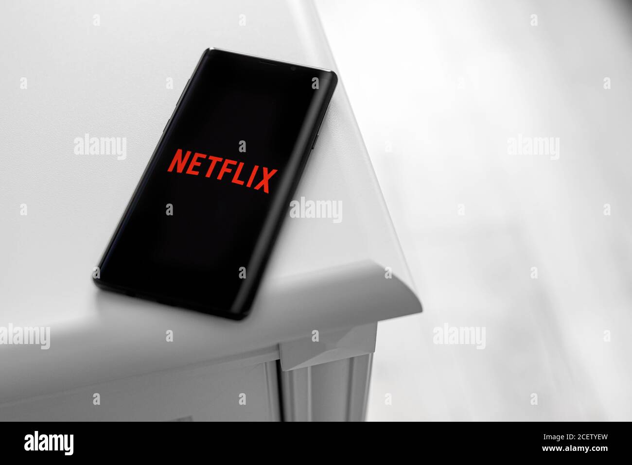 Netflix company logo on the smartphone screen Stock Photo - Alamy