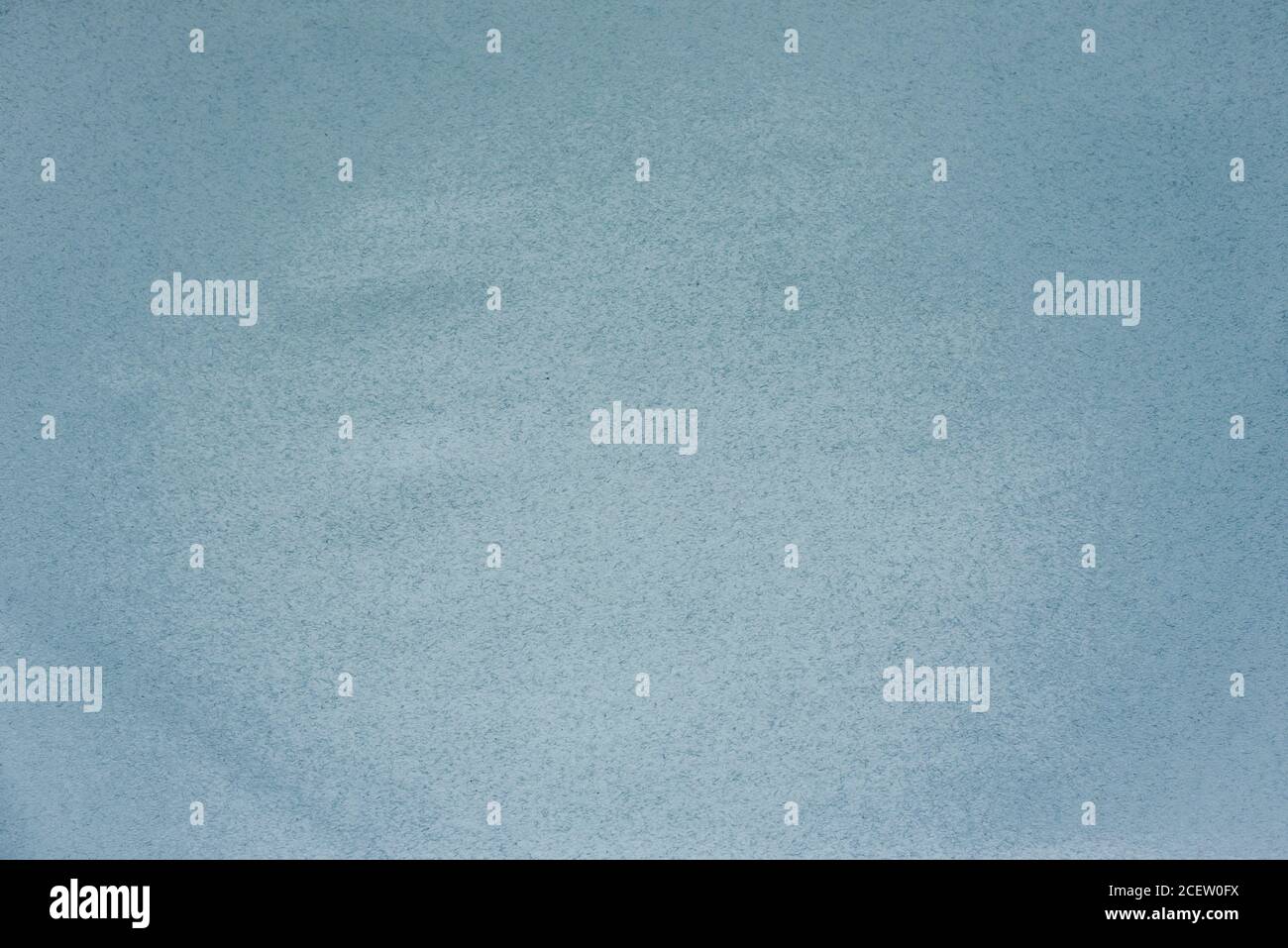 Blue background in grain, granular background for design, copy space ...