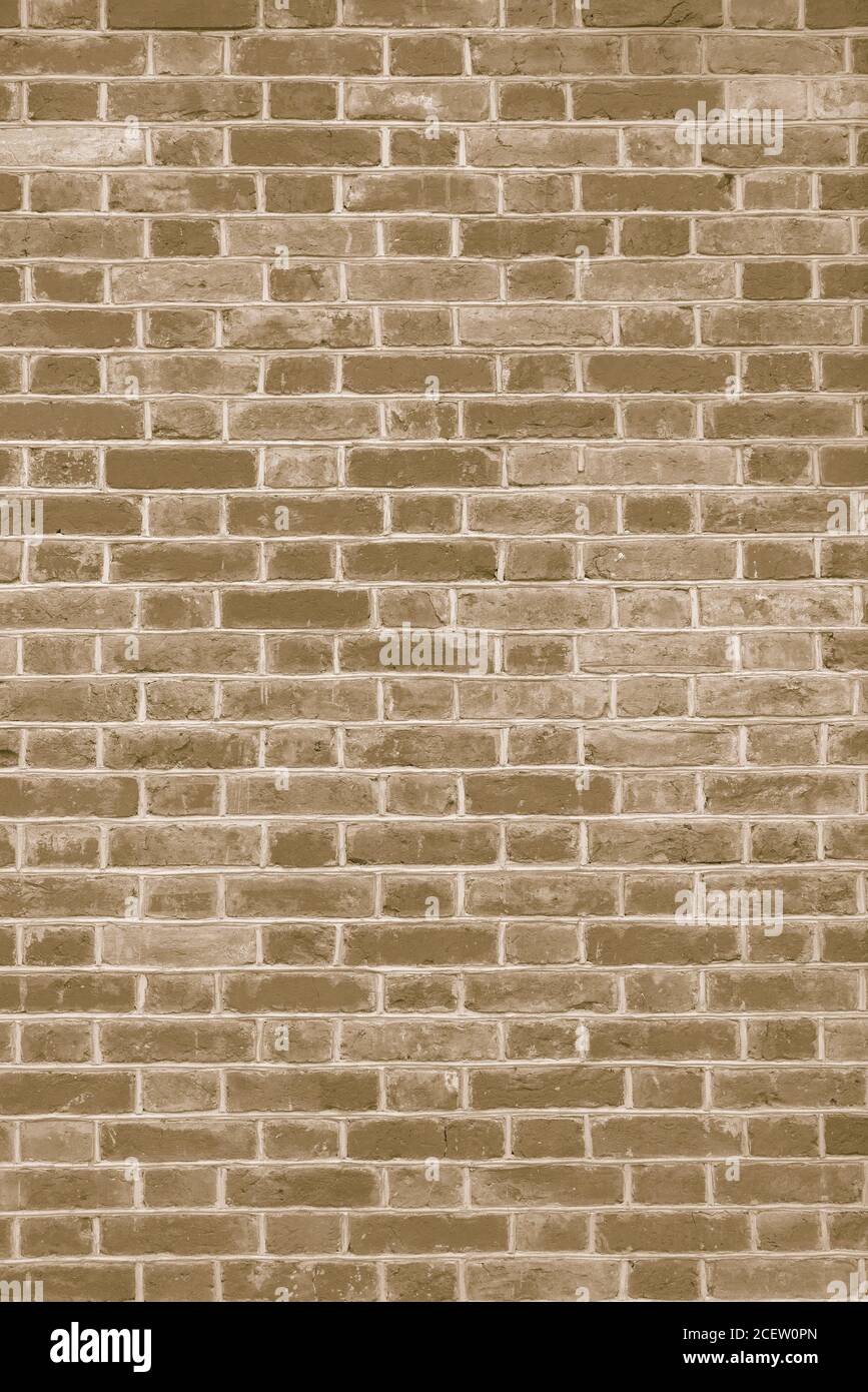 Beige brick building wall. Interior of a modern loft. Background for ...