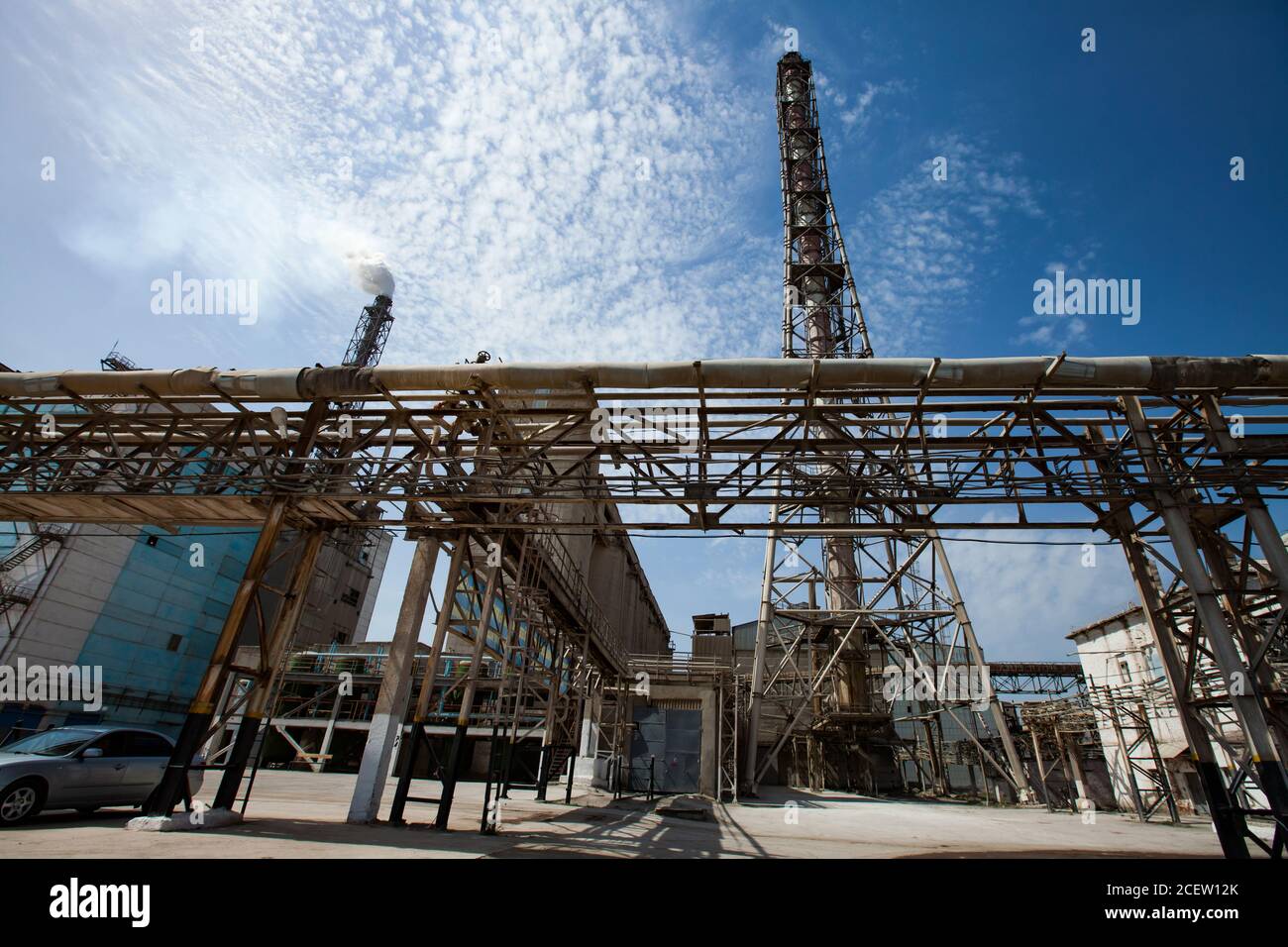 Industrial building tall chimney hi-res stock photography and images ...