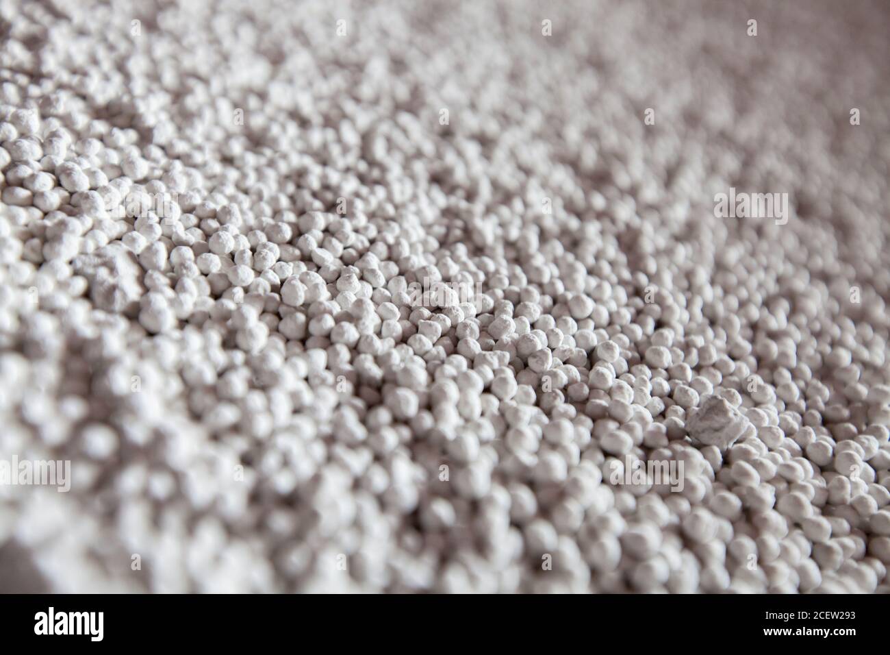 White granules (pellets) of phosphoric (phosphate) fertilizers on ...