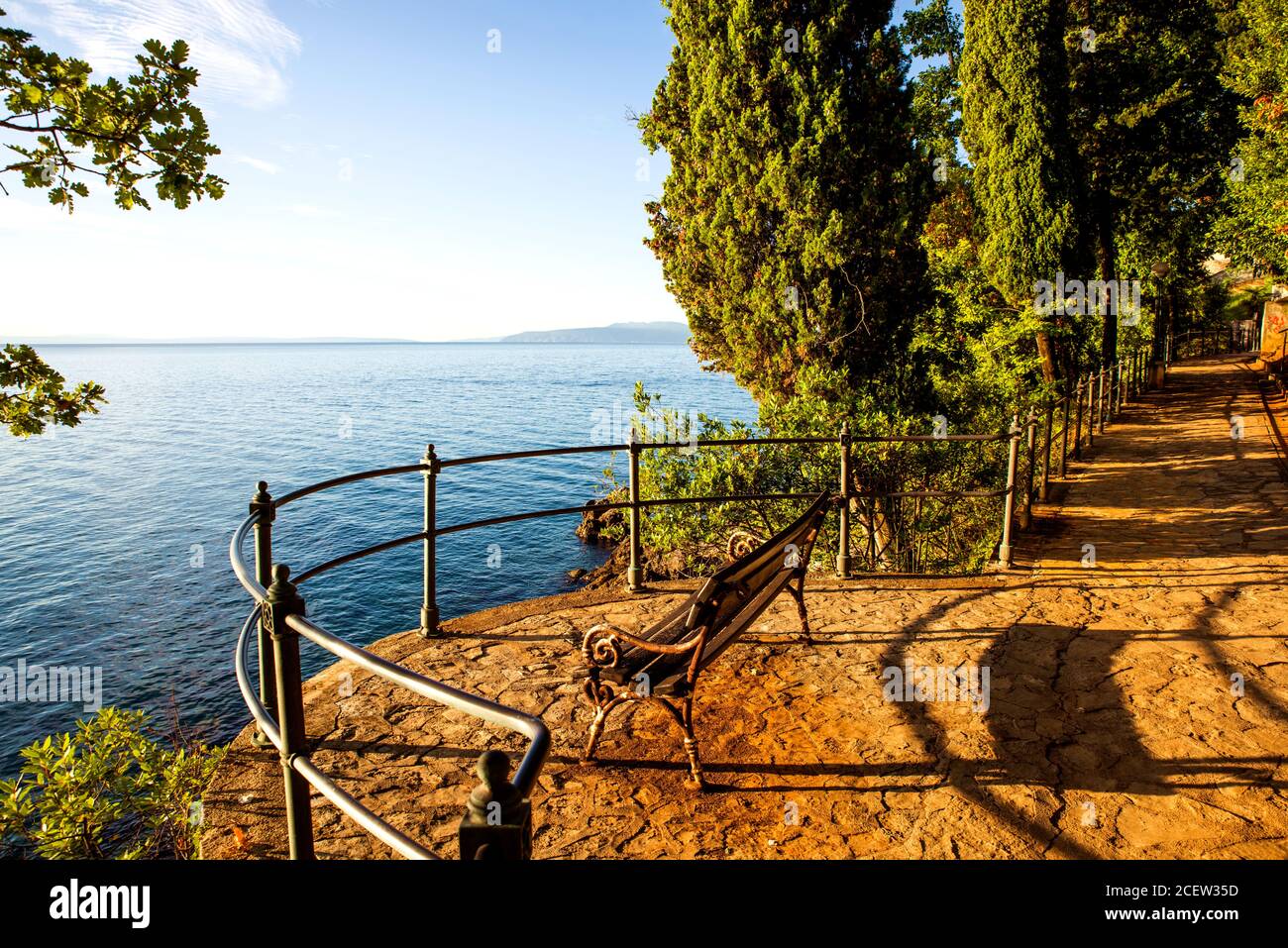 Beautiful viewpoint with bench at the seaside Stock Photo - Alamy
