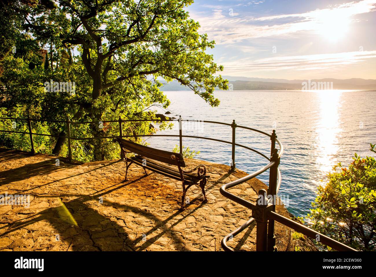 Beautiful viewpoint with bench at the seaside Stock Photo - Alamy