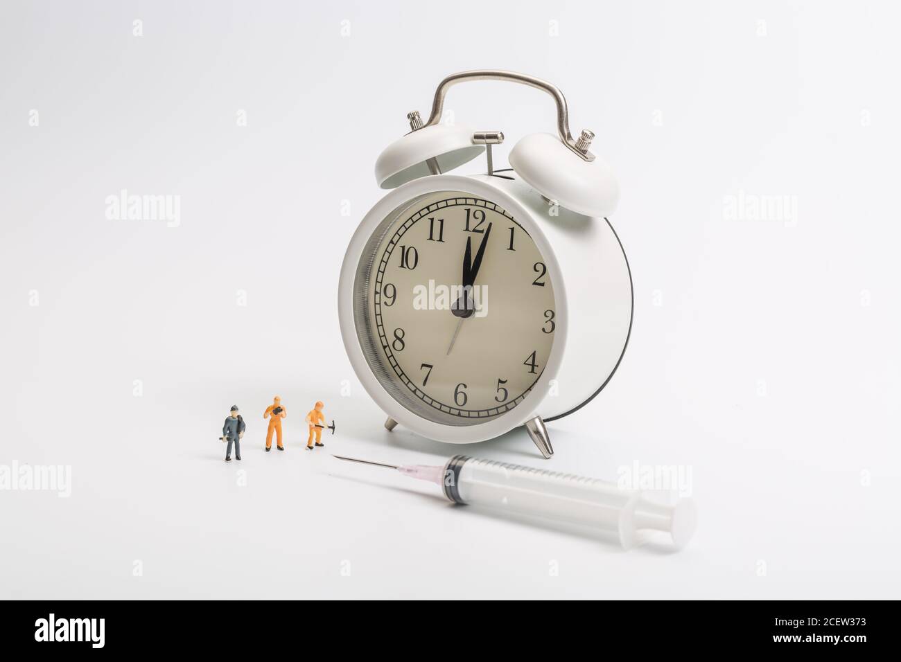 Clock worker hi-res stock photography and images - Alamy