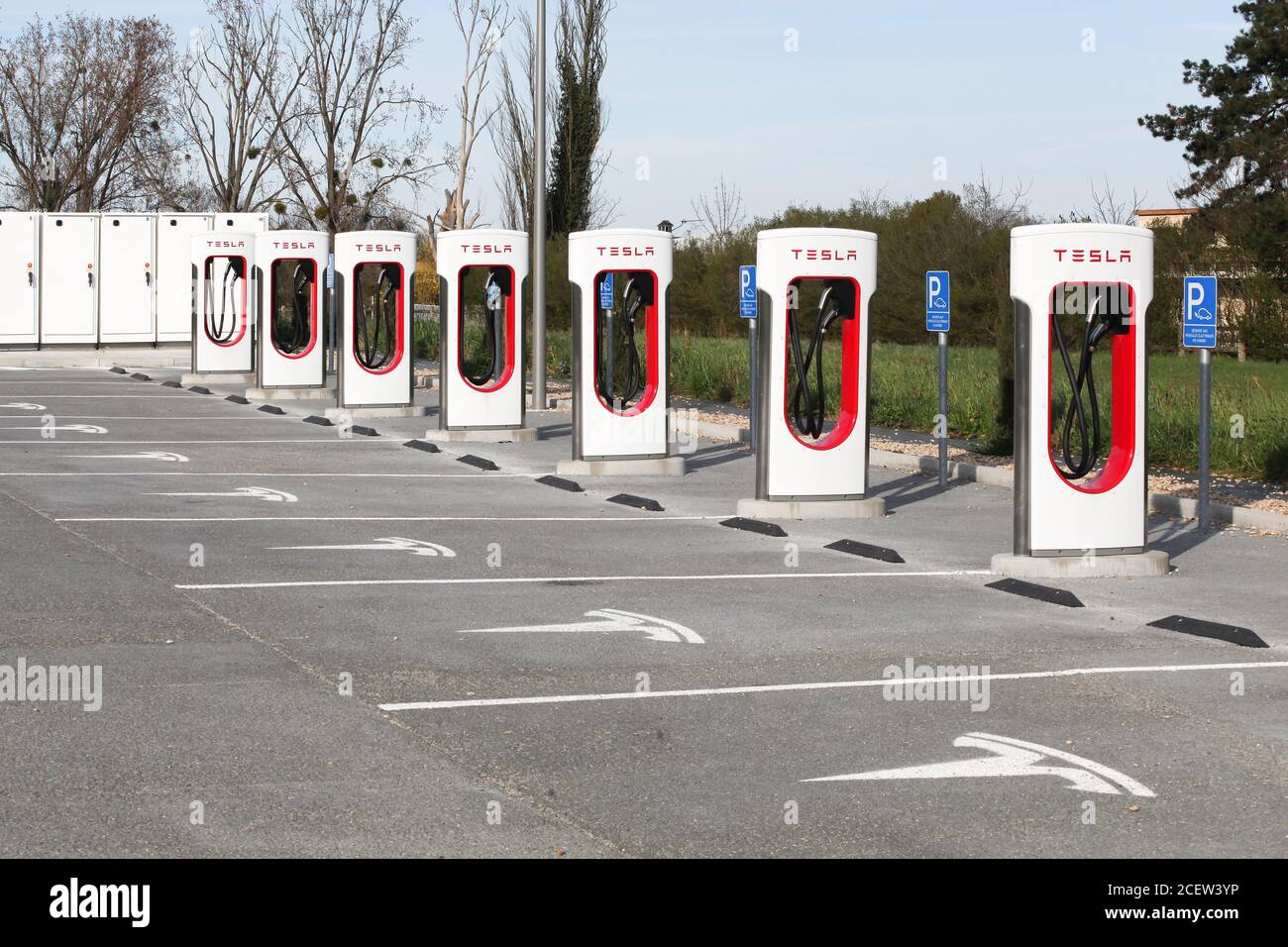 Sance, France - March 15, 2020: Tesla supercharger station. Tesla is an ...