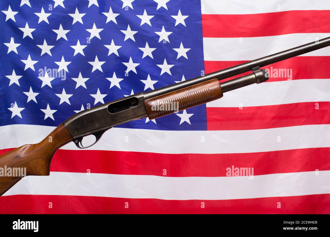 Shotgun and American Flag symbolizing gun control and rights Stock ...