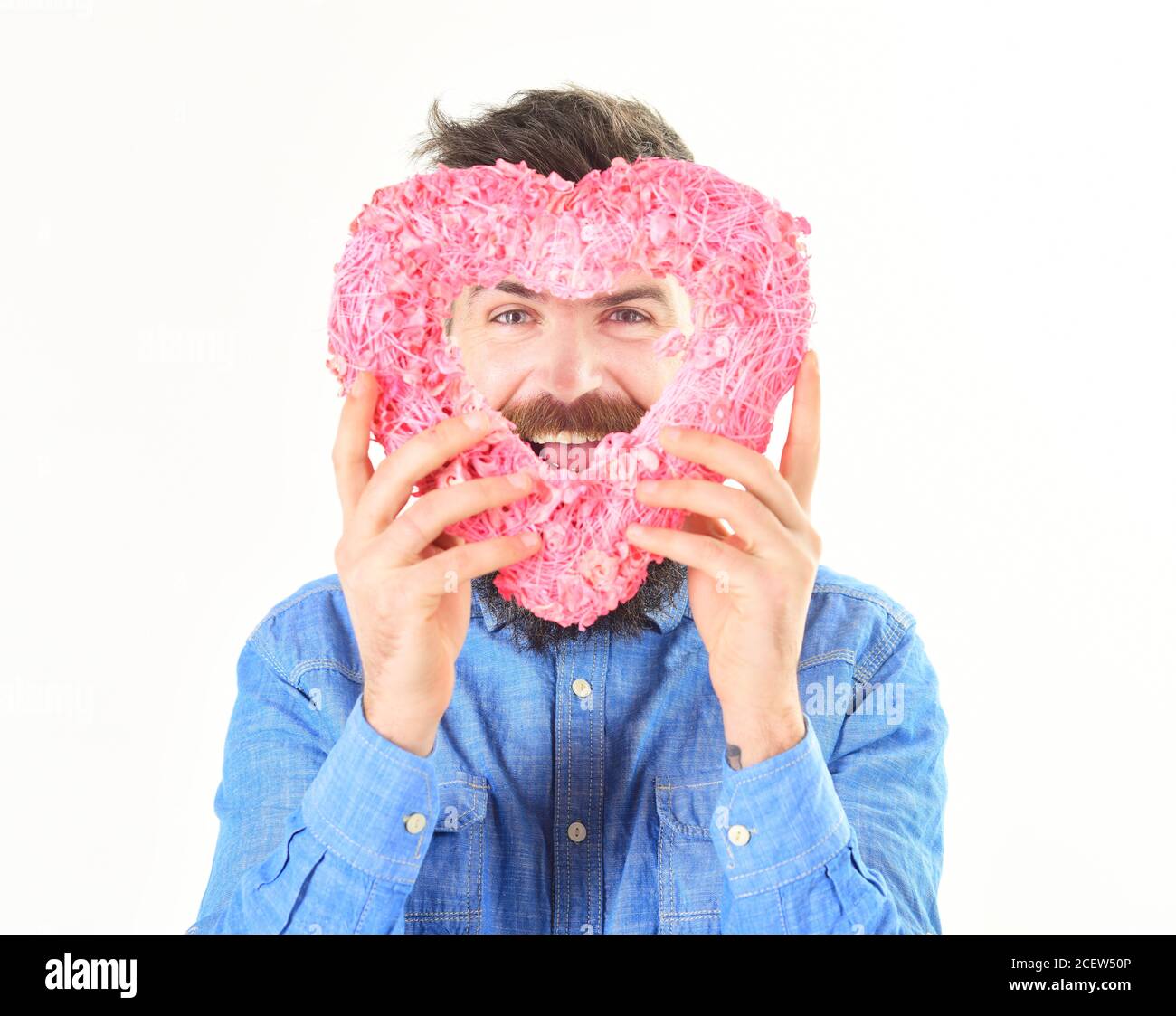 Macho in love, shows his romantic feelings. Man with happy face looks ...