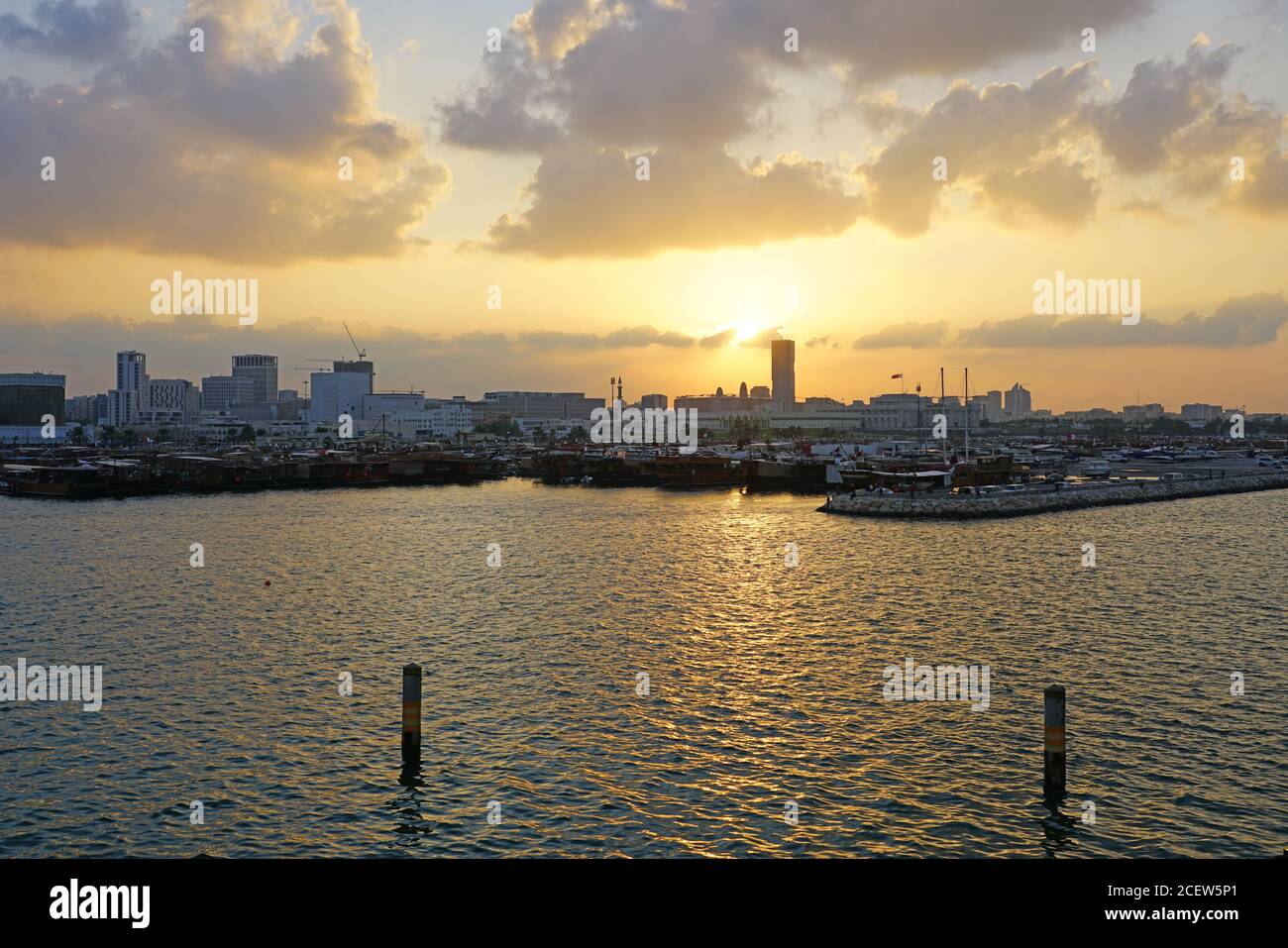 DOHA, QATAR -12 DEC 2019- Sunset view of the water and skyline in Doha ...
