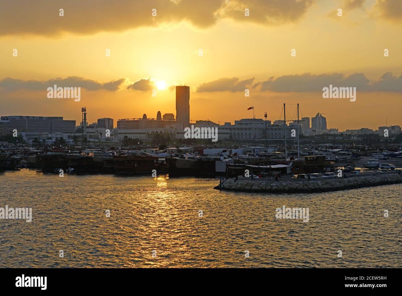 DOHA, QATAR -12 DEC 2019- Sunset view of the water and skyline in Doha ...