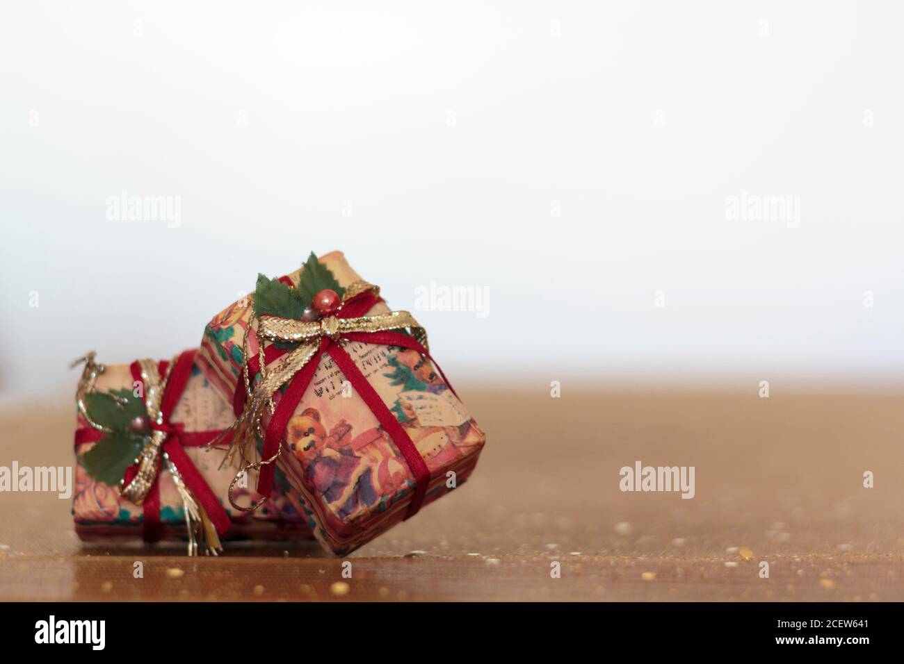 Christmas gifts on table with copy space Stock Photo - Alamy
