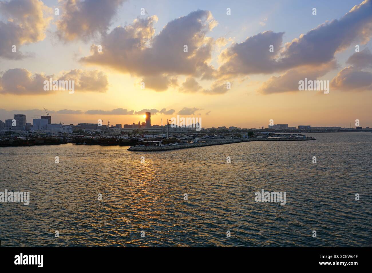 DOHA, QATAR -12 DEC 2019- Sunset view of the water and skyline in Doha ...