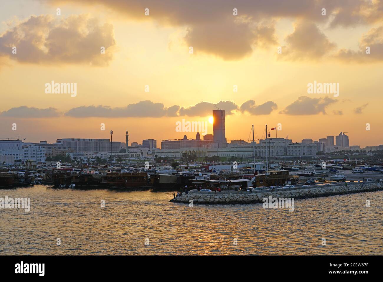 DOHA, QATAR -12 DEC 2019- Sunset view of the water and skyline in Doha ...