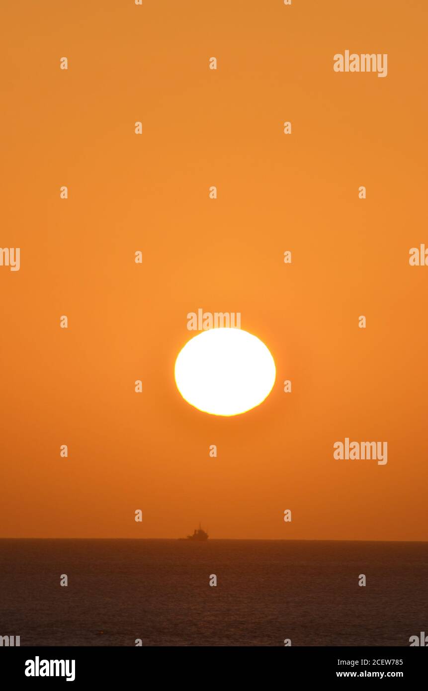 Ship at sunrise hi-res stock photography and images - Alamy