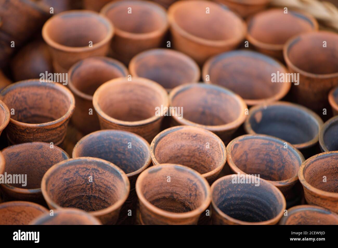 clay pots are in rows. view from above Stock Photo - Alamy