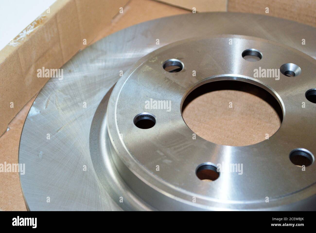 brand new still in the box disc brake rotor Stock Photo - Alamy