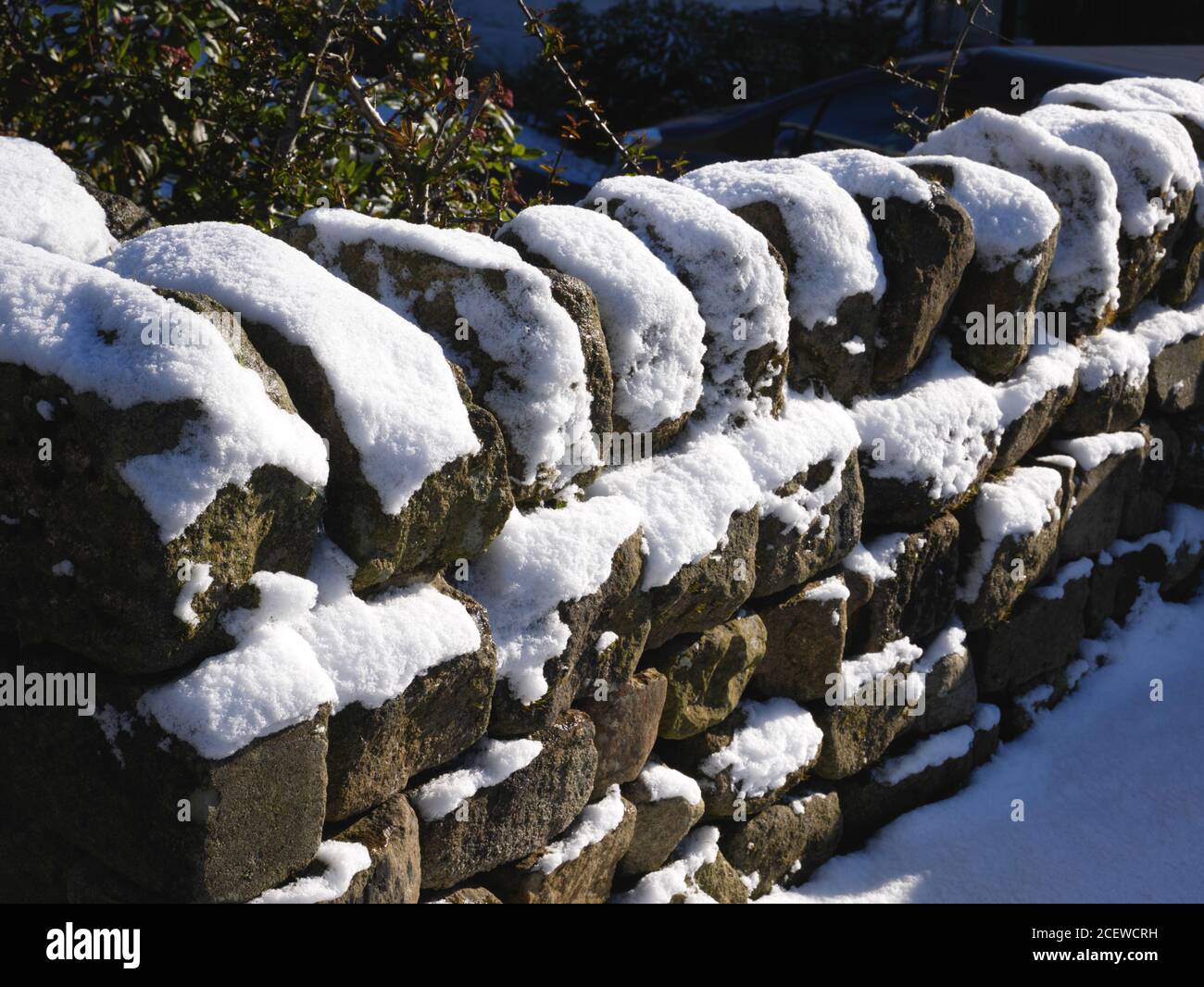 Snow covered stone wall hi-res stock photography and images - Alamy
