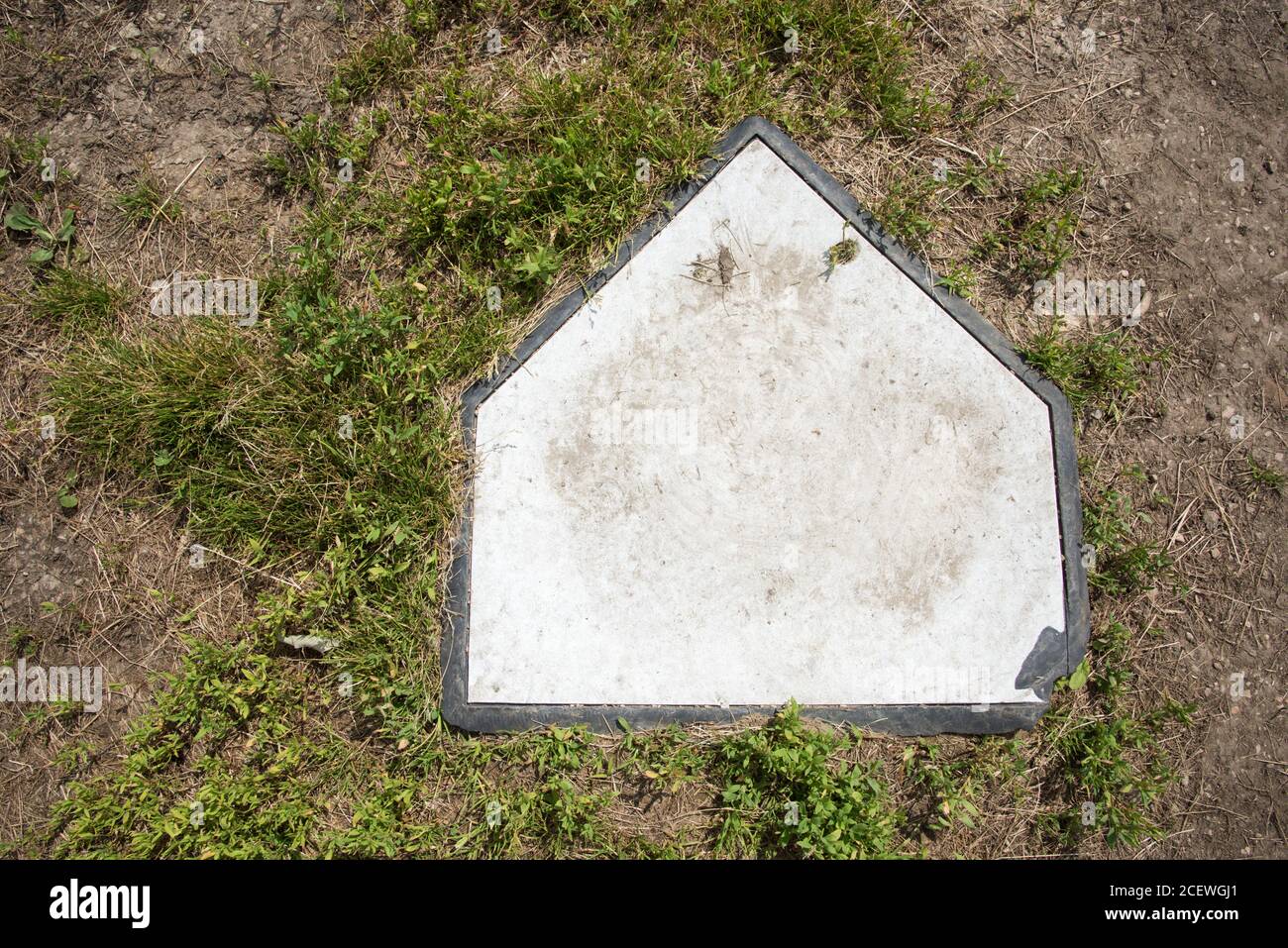 View from above over white home base pentagon shaped rubber baseball ...