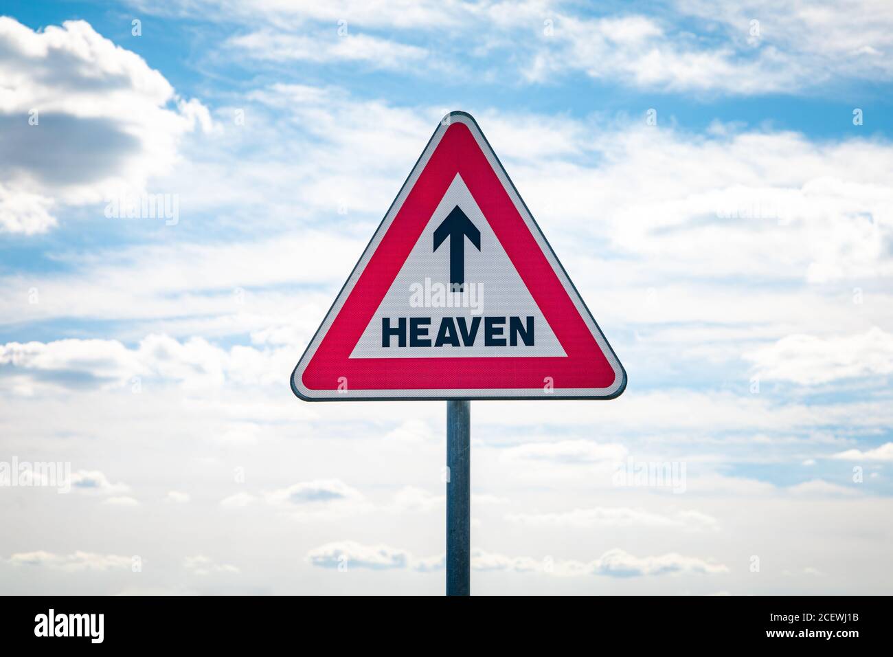 Roadsign with an arrow inside pointing to heaven Stock Photo - Alamy