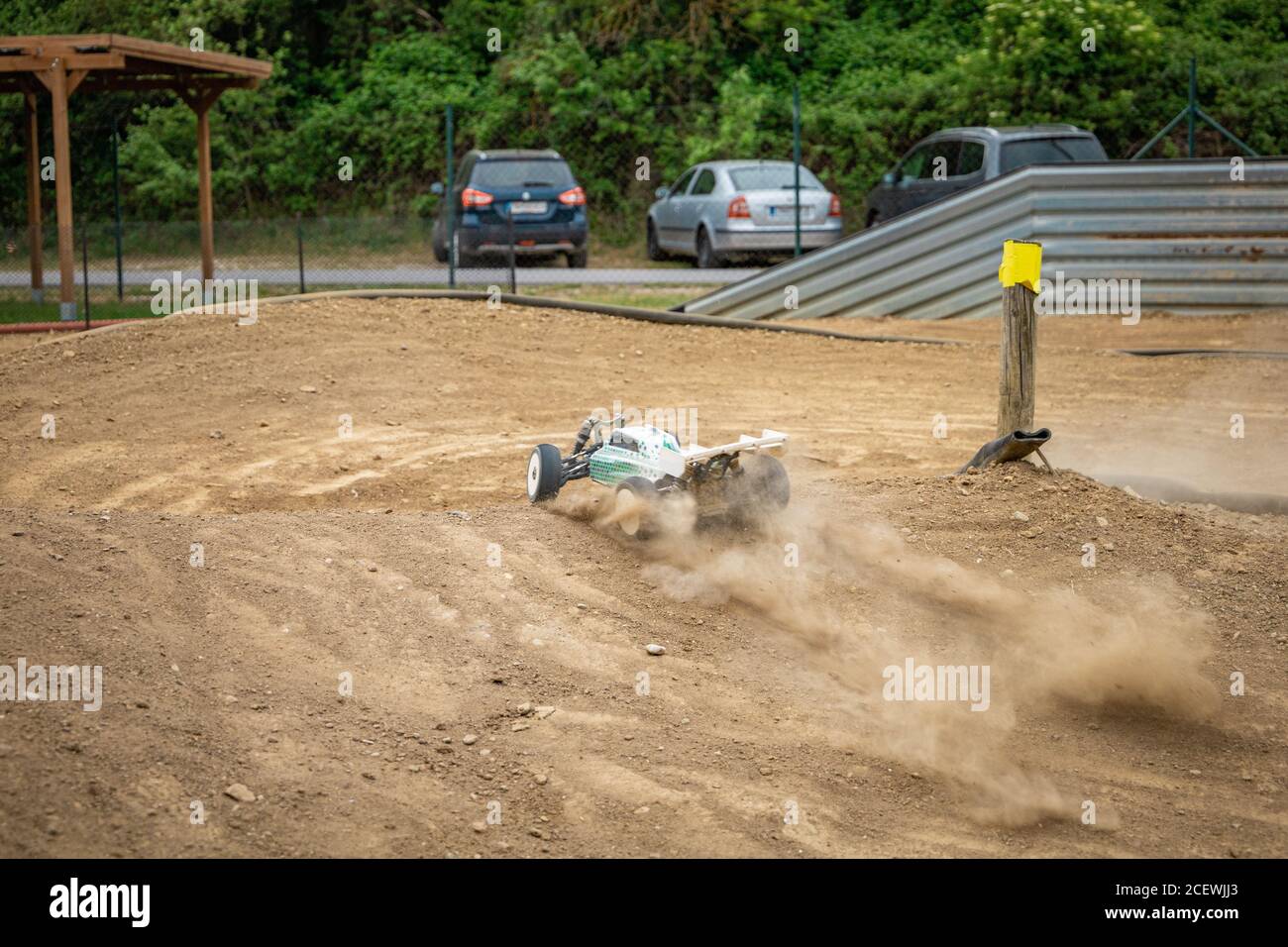 Offroad RC buggy driving on an outdoor dirt track Stock Photo - Alamy