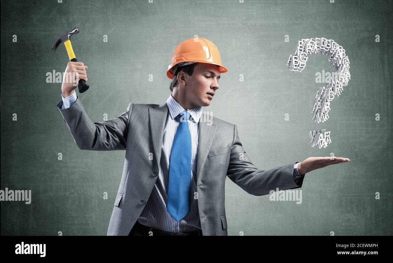 Businessman going to crash question mark Stock Photo - Alamy