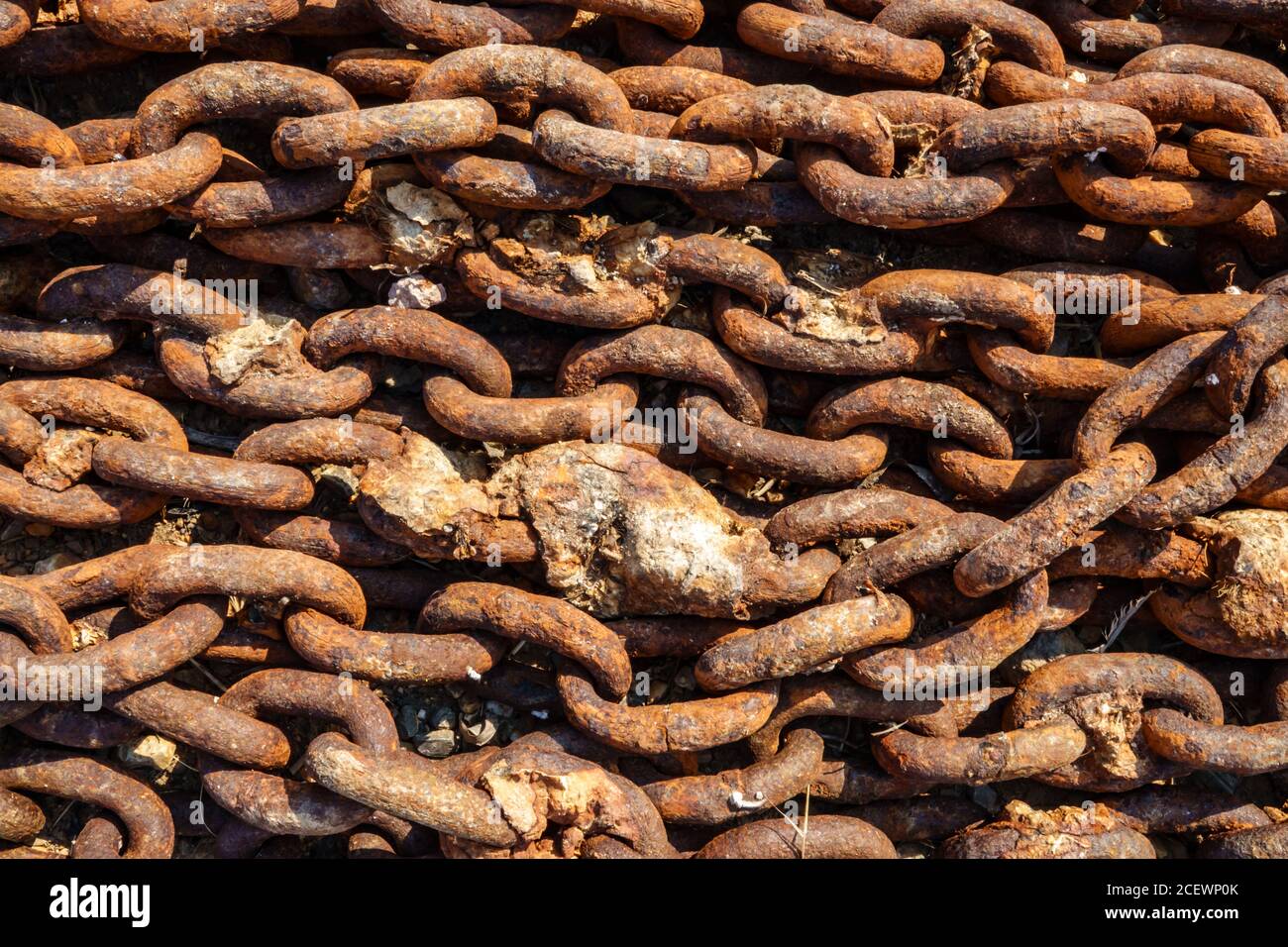 Rusty anchor on stone hi-res stock photography and images - Alamy