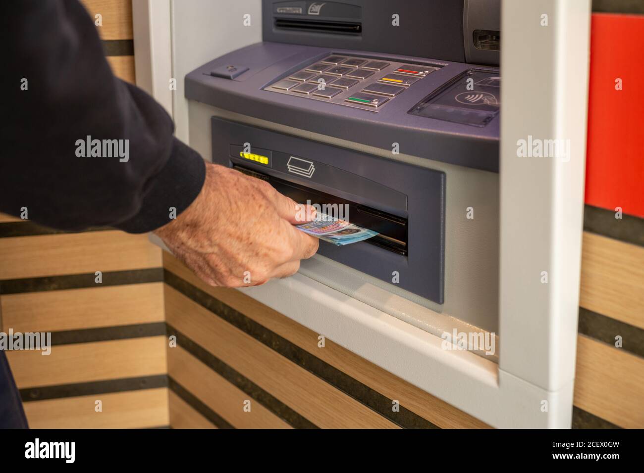 Cash withdrawal bank counter hi-res stock photography and images - Alamy