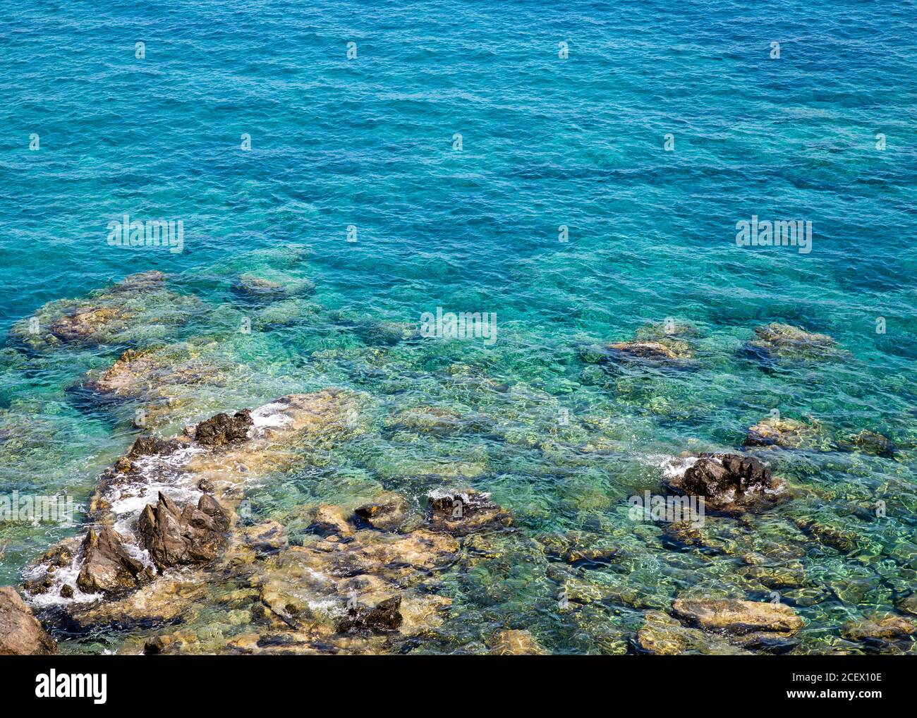 Aerial view rocks under turquoise hi-res stock photography and images ...