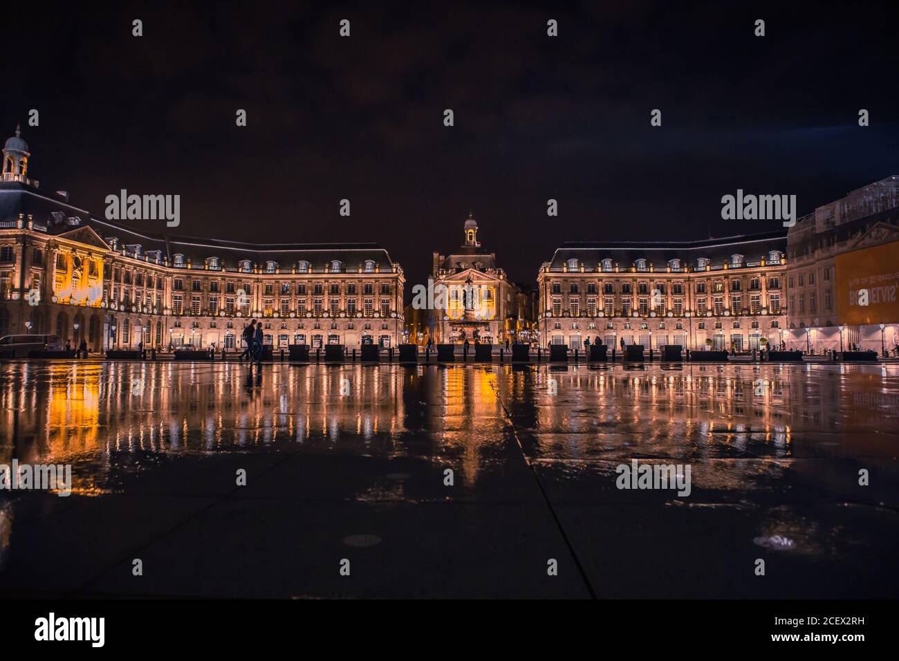 The night view of the water mirror plaza in Bordeaux, France Stock ...