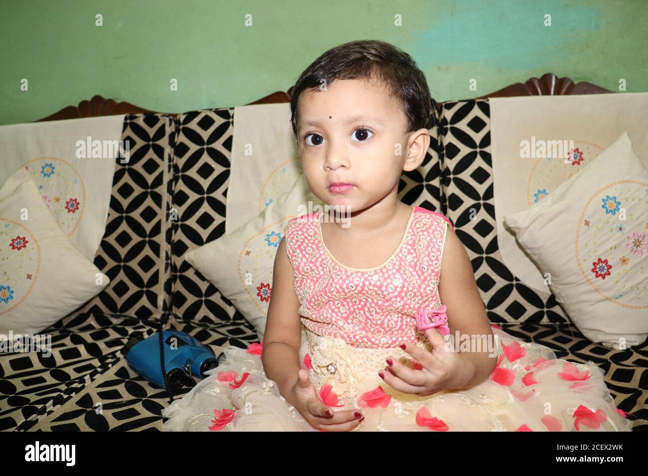 Kid explaining something to her senior Stock Photo - Alamy