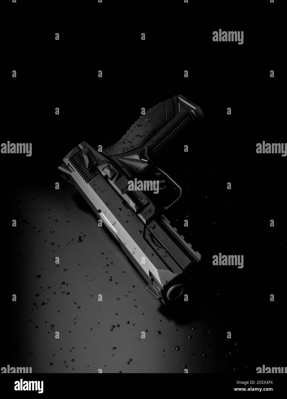 Modern black pistol on a dark background. Armament for the police, army ...
