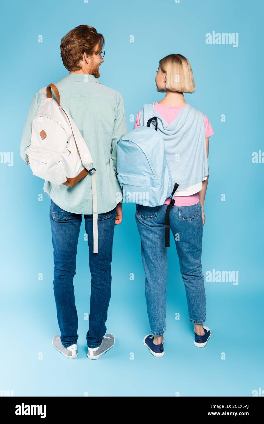 Back view students backpacks hi-res stock photography and images - Alamy