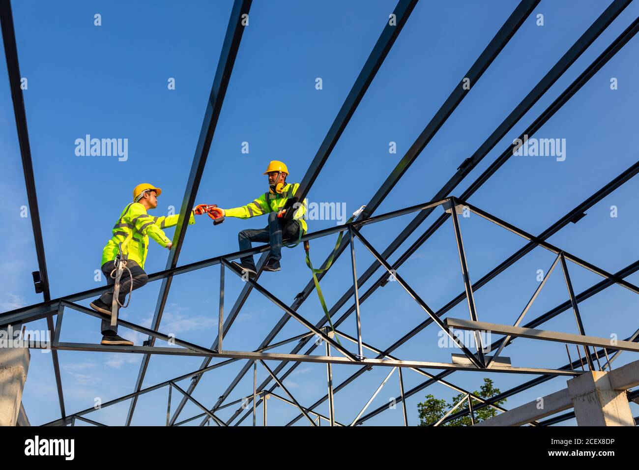 Safety height equipment in the construction site; Asian worker wear ...