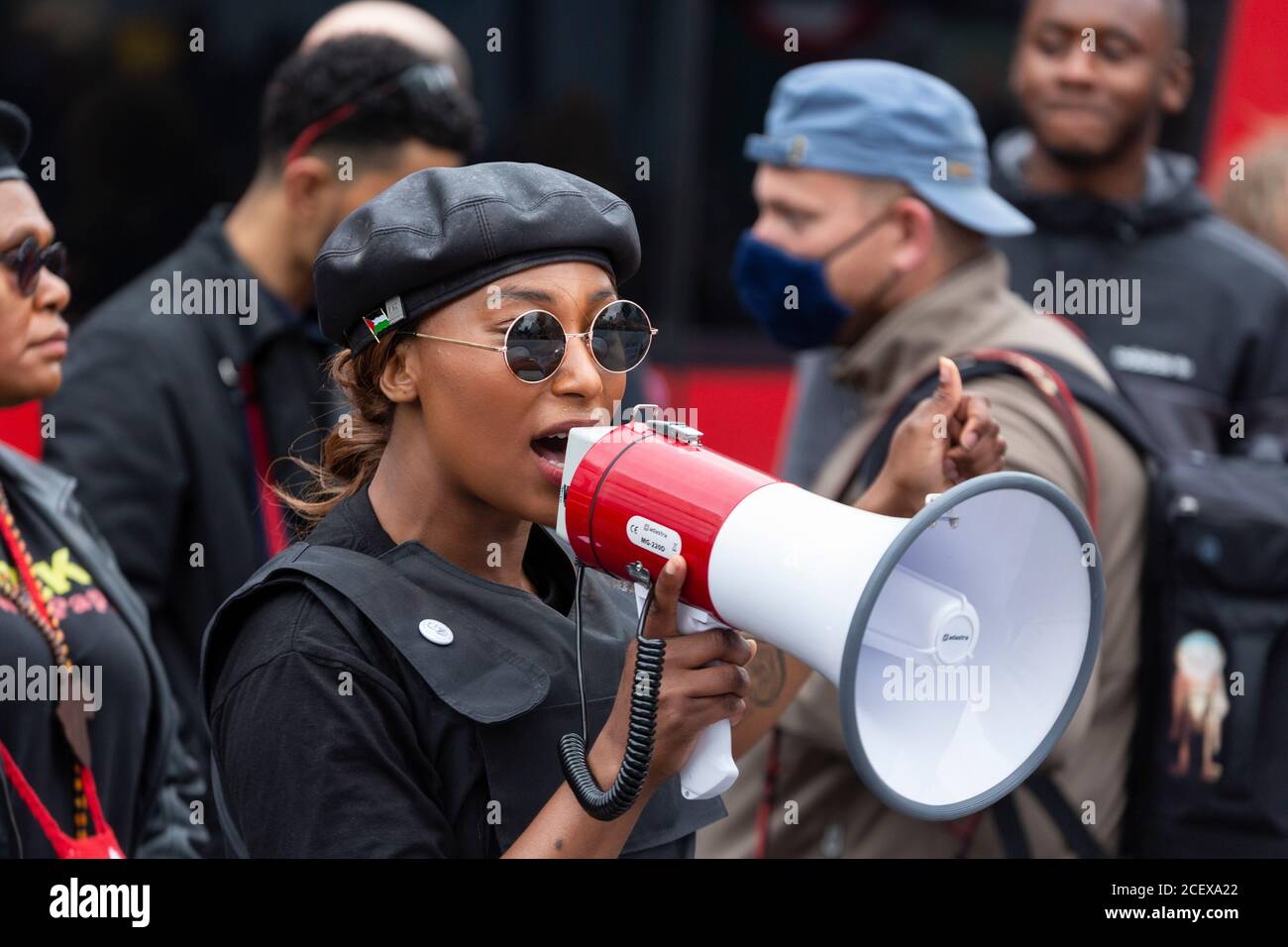 Activist Sasha Johnson speaks into a megaphone during the Million ...