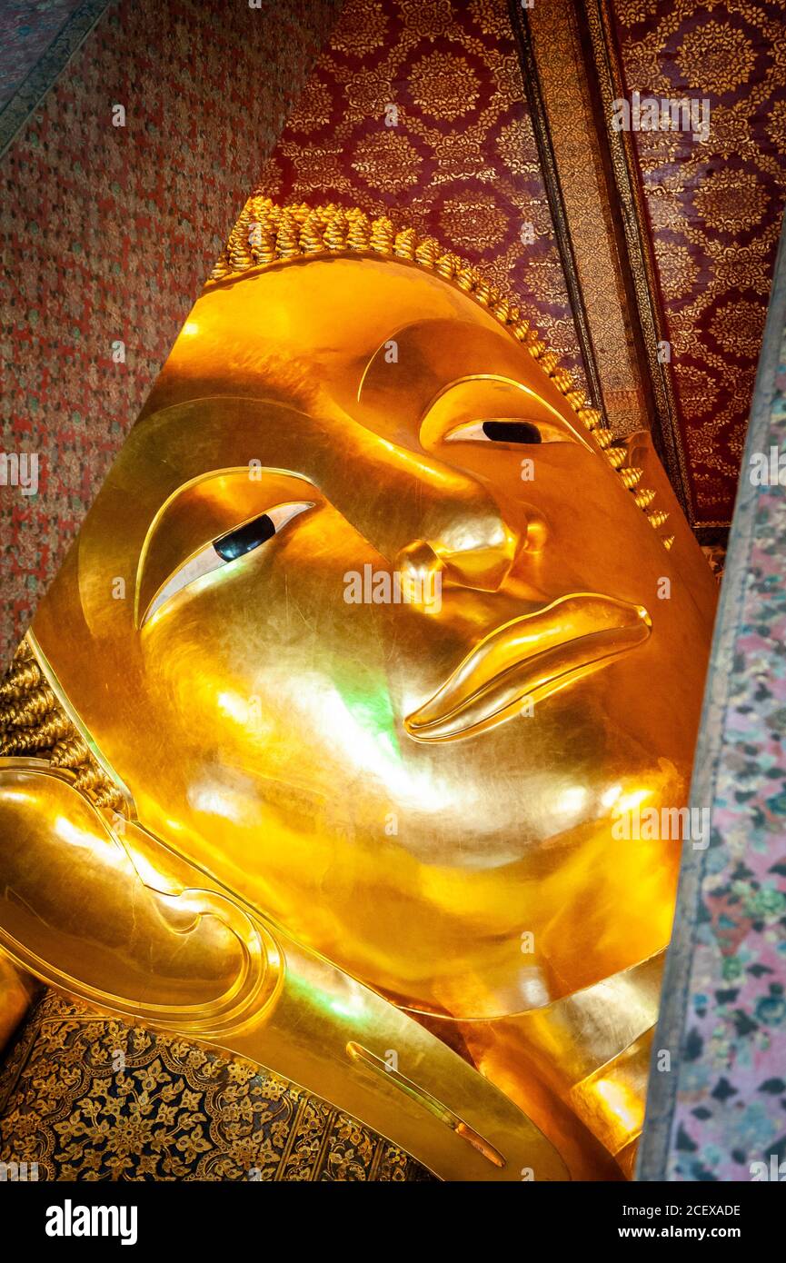 The giant Reclining Buddha in Wat Po Temple Bangkok, Thailand Stock ...
