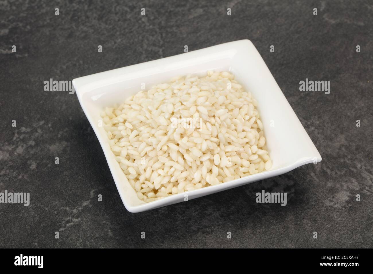 Raw Arborio rice for Italian risotto Stock Photo - Alamy