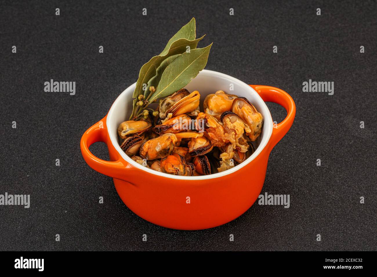 Pickled mussels with spices in the bowl Stock Photo - Alamy