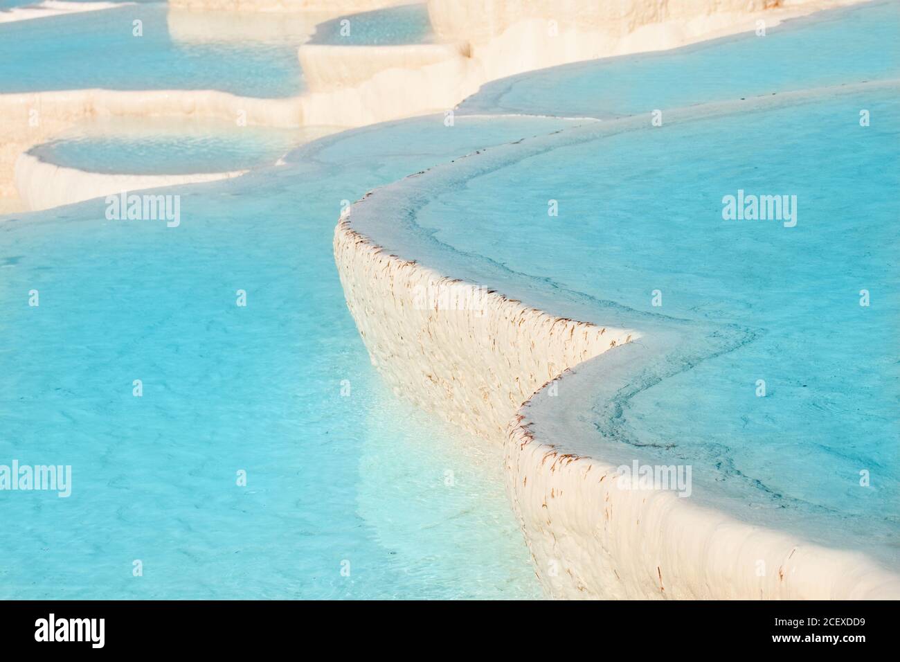 Natural travertine pools and terraces, Pamukkale, Turkey Stock Photo ...